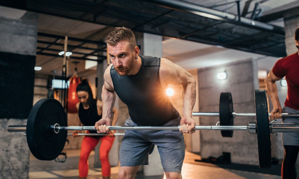 Remo con barra: guía completa para una espalda fuerte 🏋️‍♂️